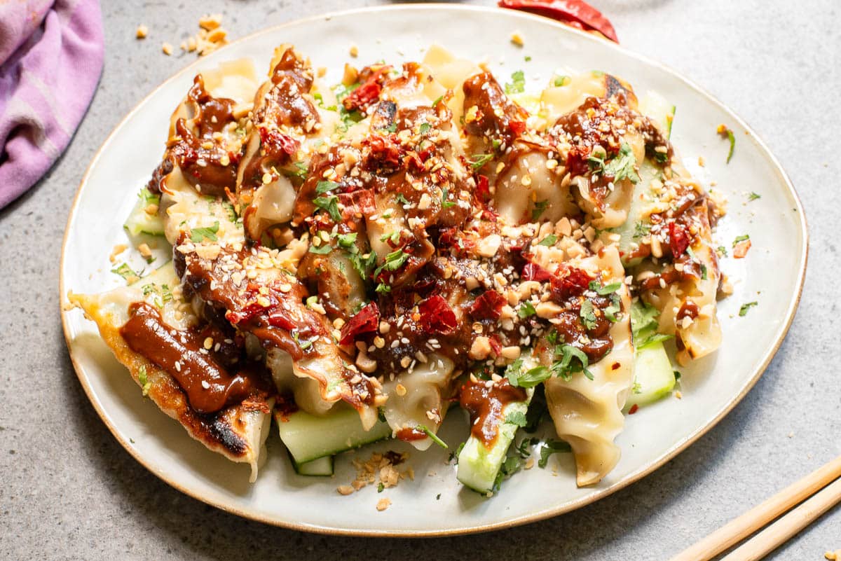 Dumpling Salad with Smashed Cucumbers and Peanut Dressing - All The Noodles
